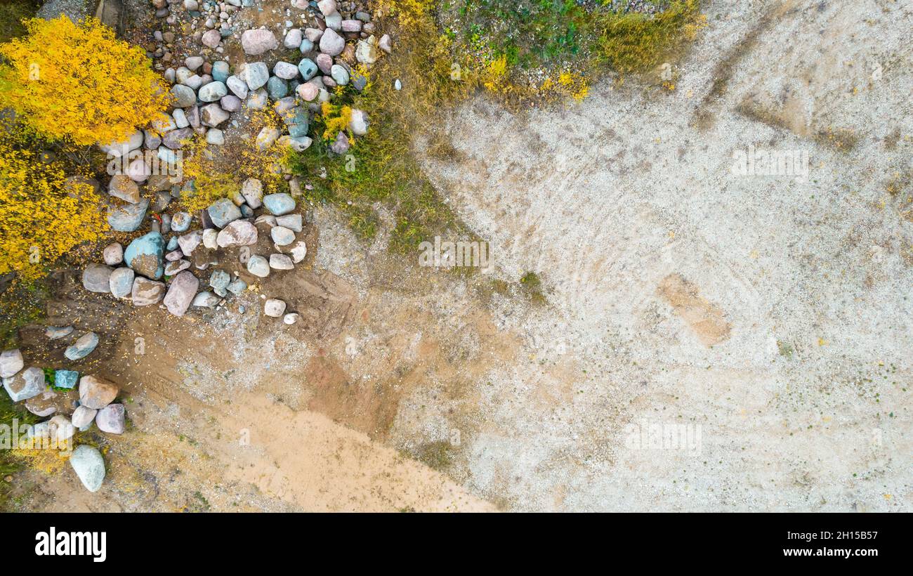 Open pit gravel mining sight with gravel field, big stones and ...