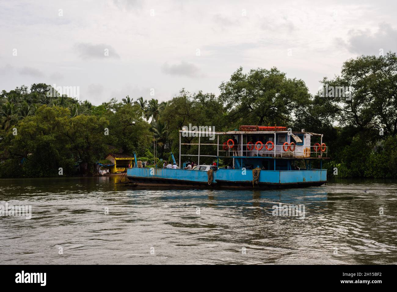 Goa, India September 15th 2021, Locals onboarding the ferry boat on ...