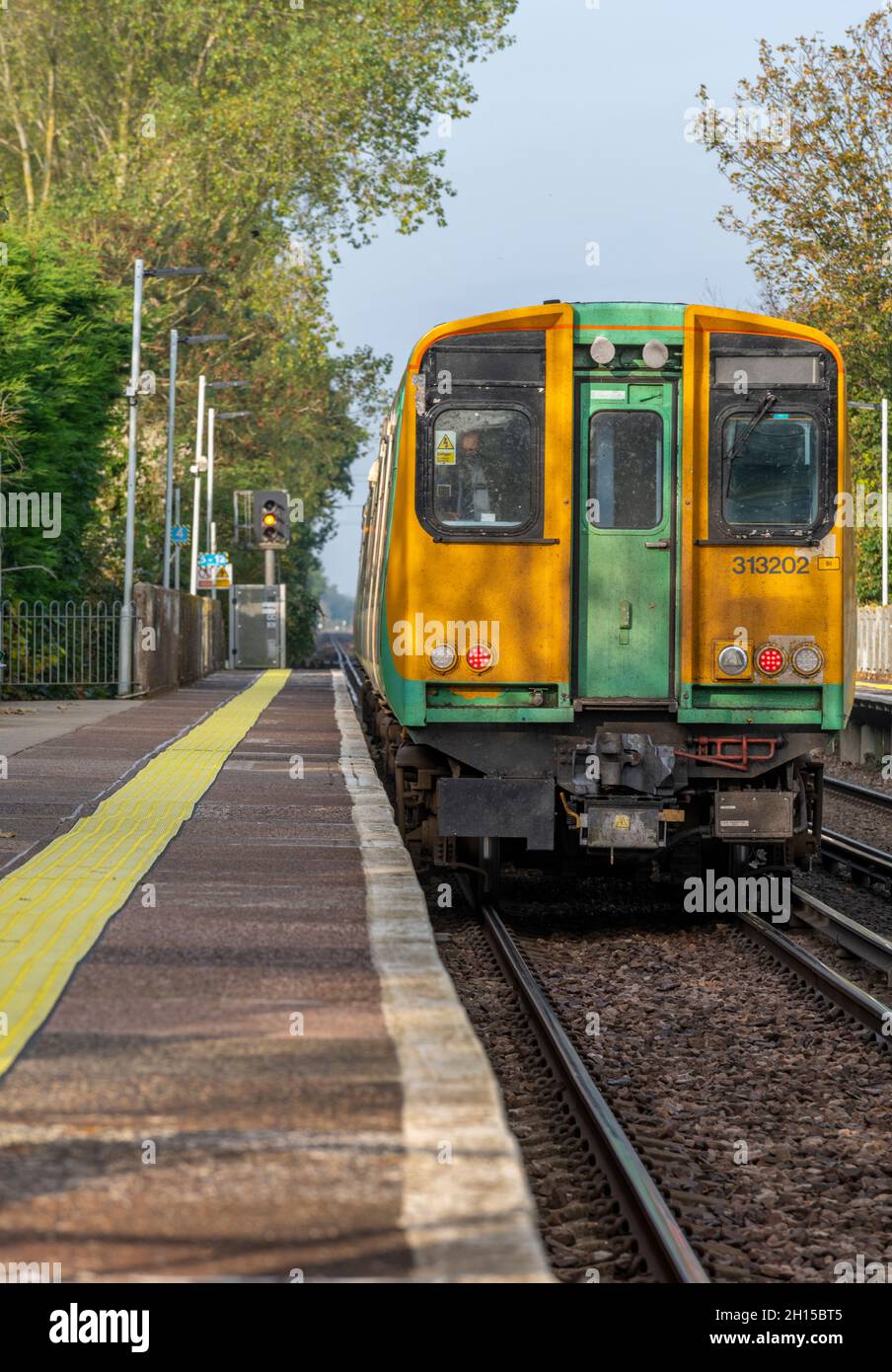 southern railways class 313 electric multiple unit EMU departing from a ...