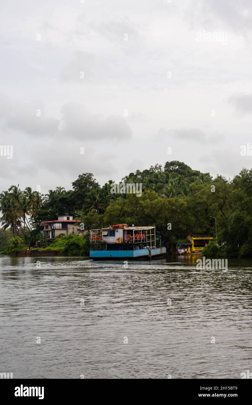 Goa, India September 15th 2021, Locals onboarding the ferry boat on ...