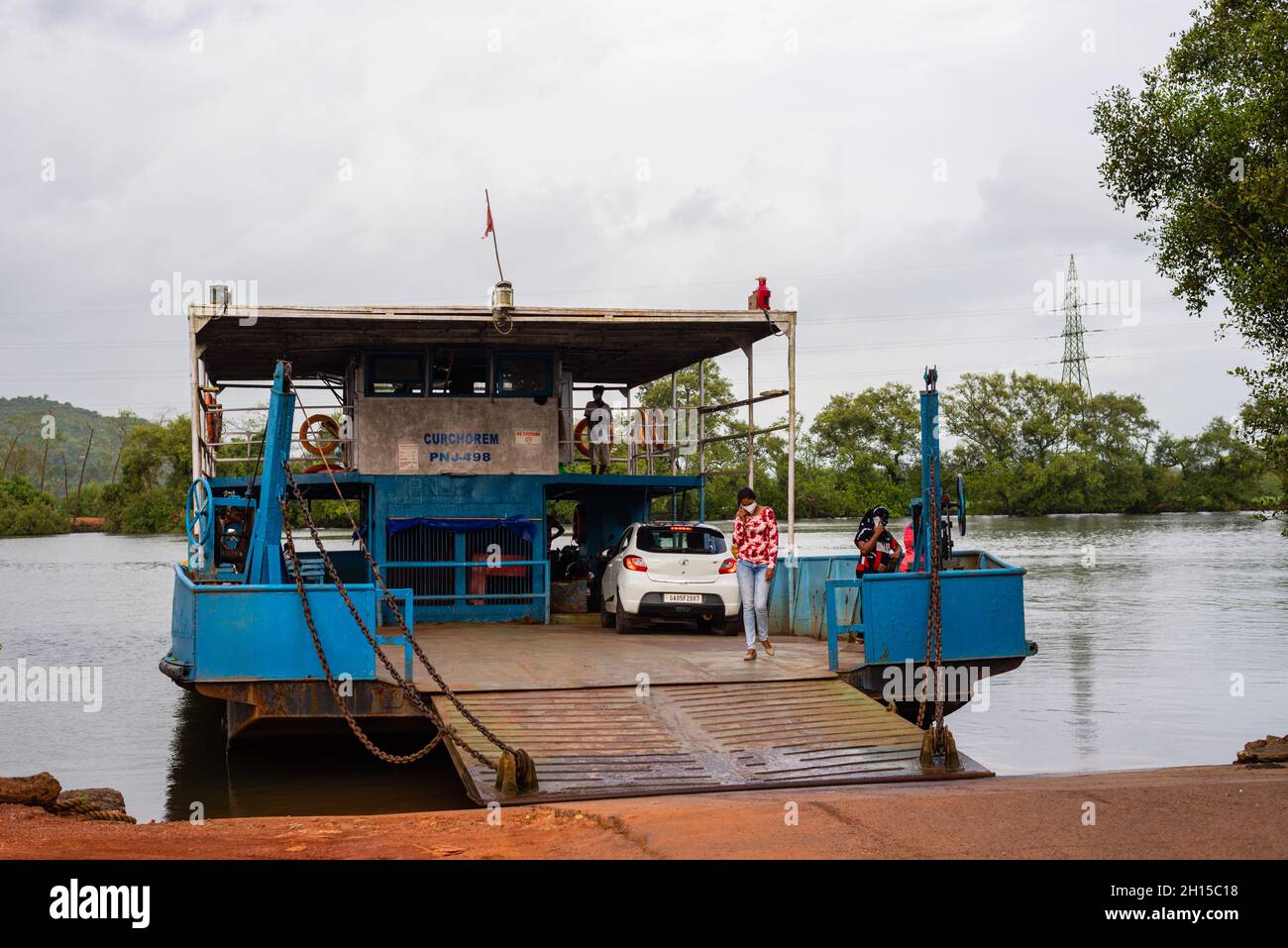 Goa, India September 15th 2021, Locals onboarding the ferry boat on ...