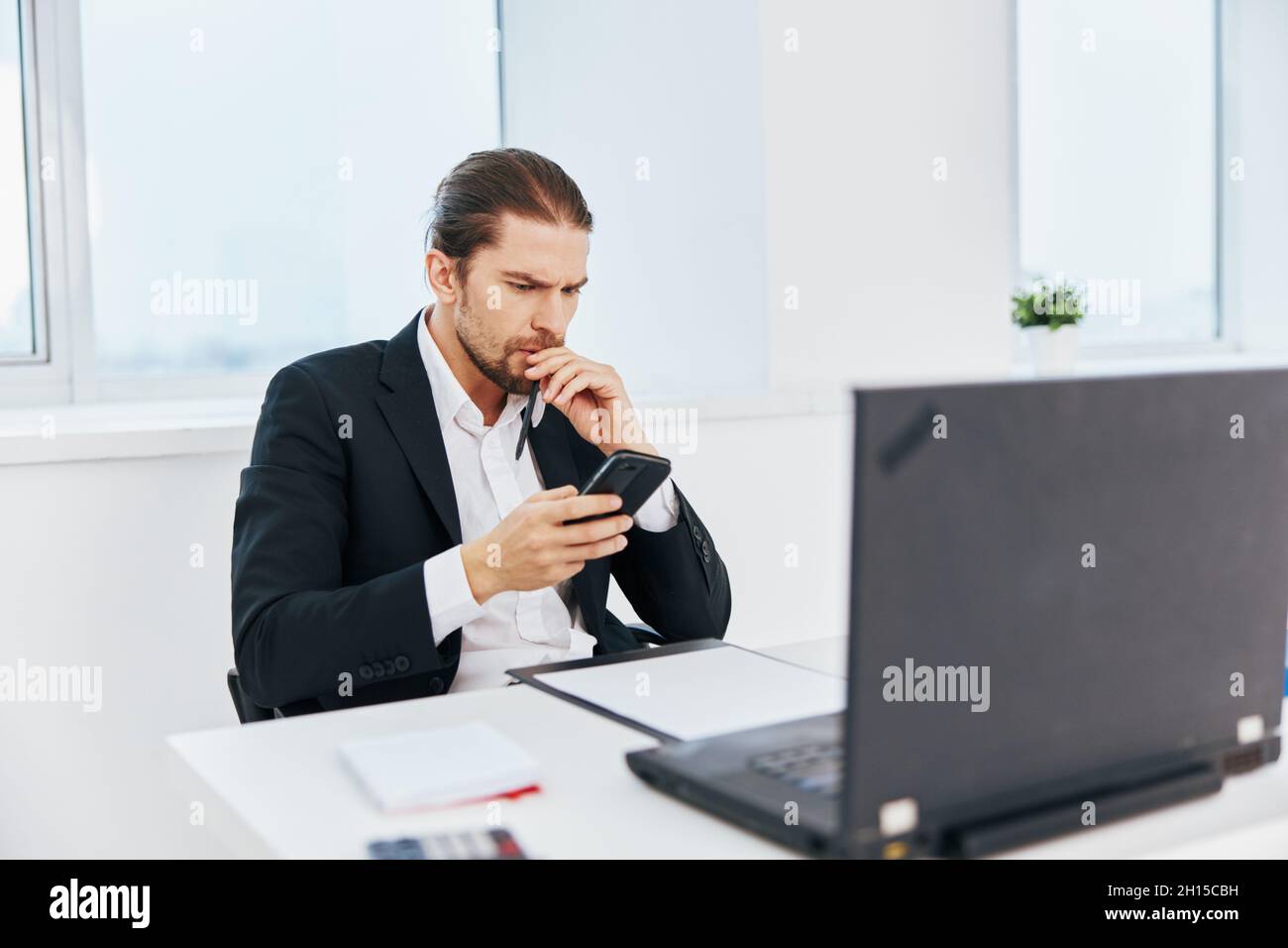 businessmen office work documents with a phone in hand boss Stock Photo ...