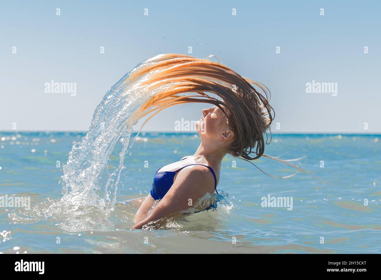 Throwing water girl hi-res stock photography and images - Alamy