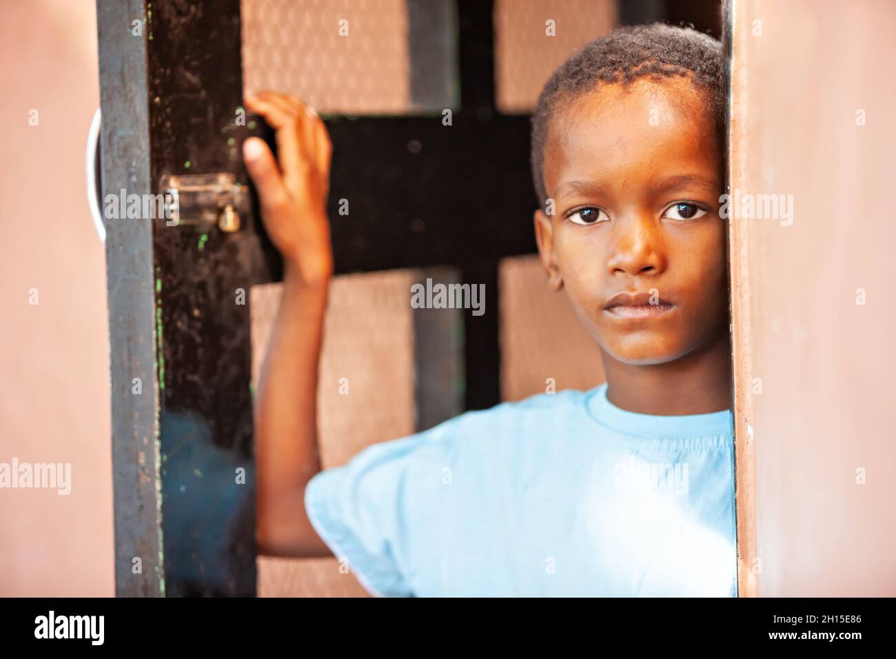 Poverty african kid village in Botswana, rural area, playing and hiding ...