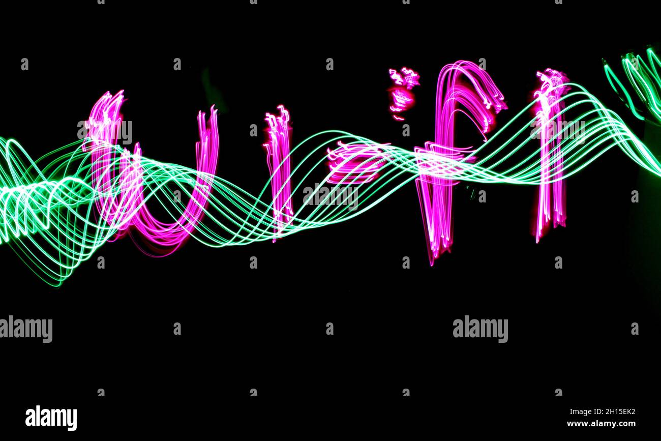 Long exposure light painting photograph of neon colour fairy lights ...