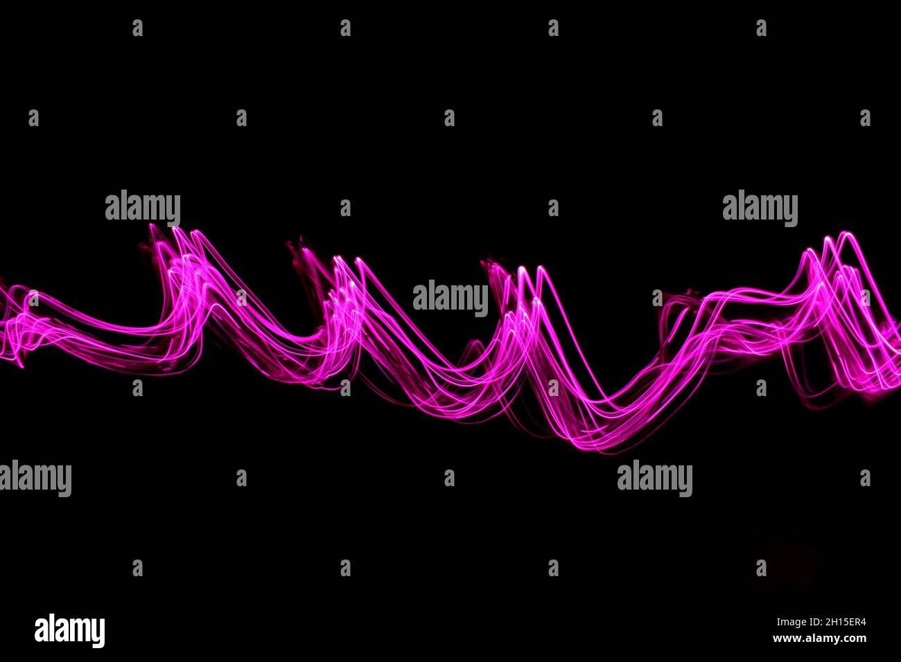 Long exposure light painting photograph of neon colour fairy lights in ...