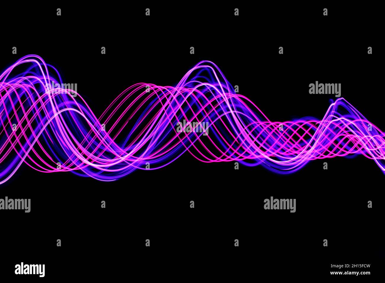 Long exposure light painting photograph of neon colour fairy lights in ...