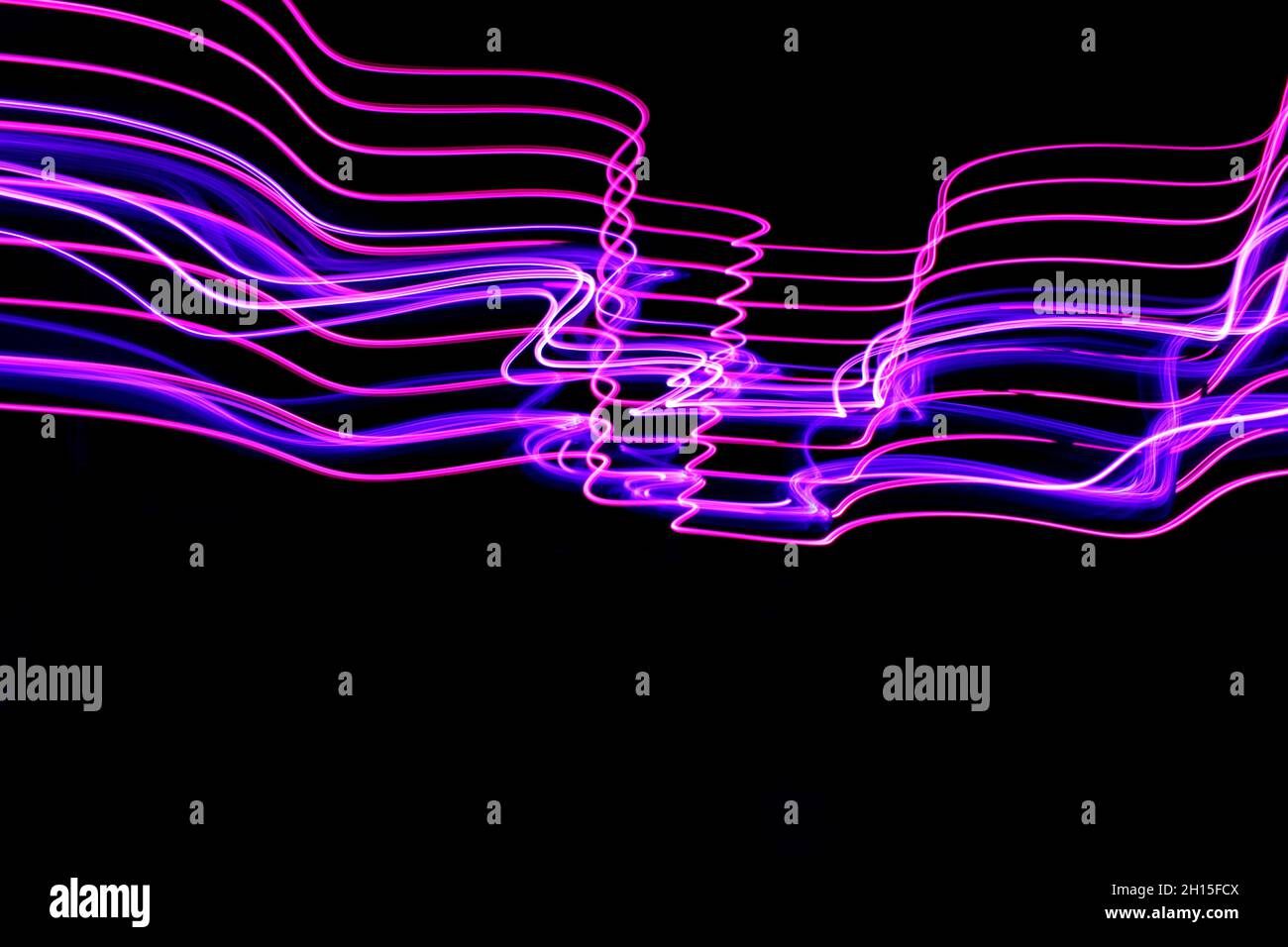 Long exposure light painting photograph of neon colour fairy lights in ...