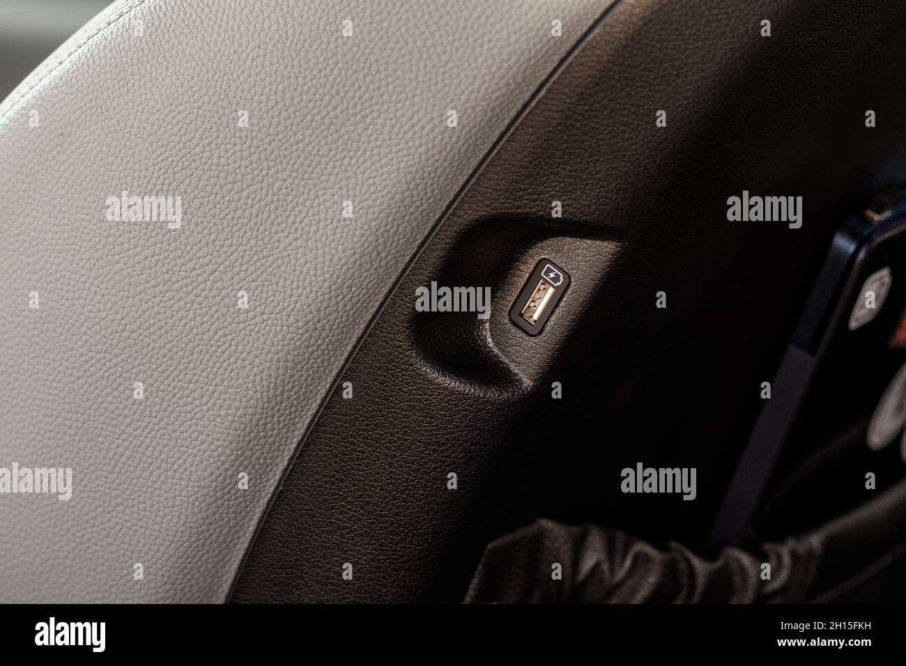 Opened car USB port in the car for connecting device. Power output of ...