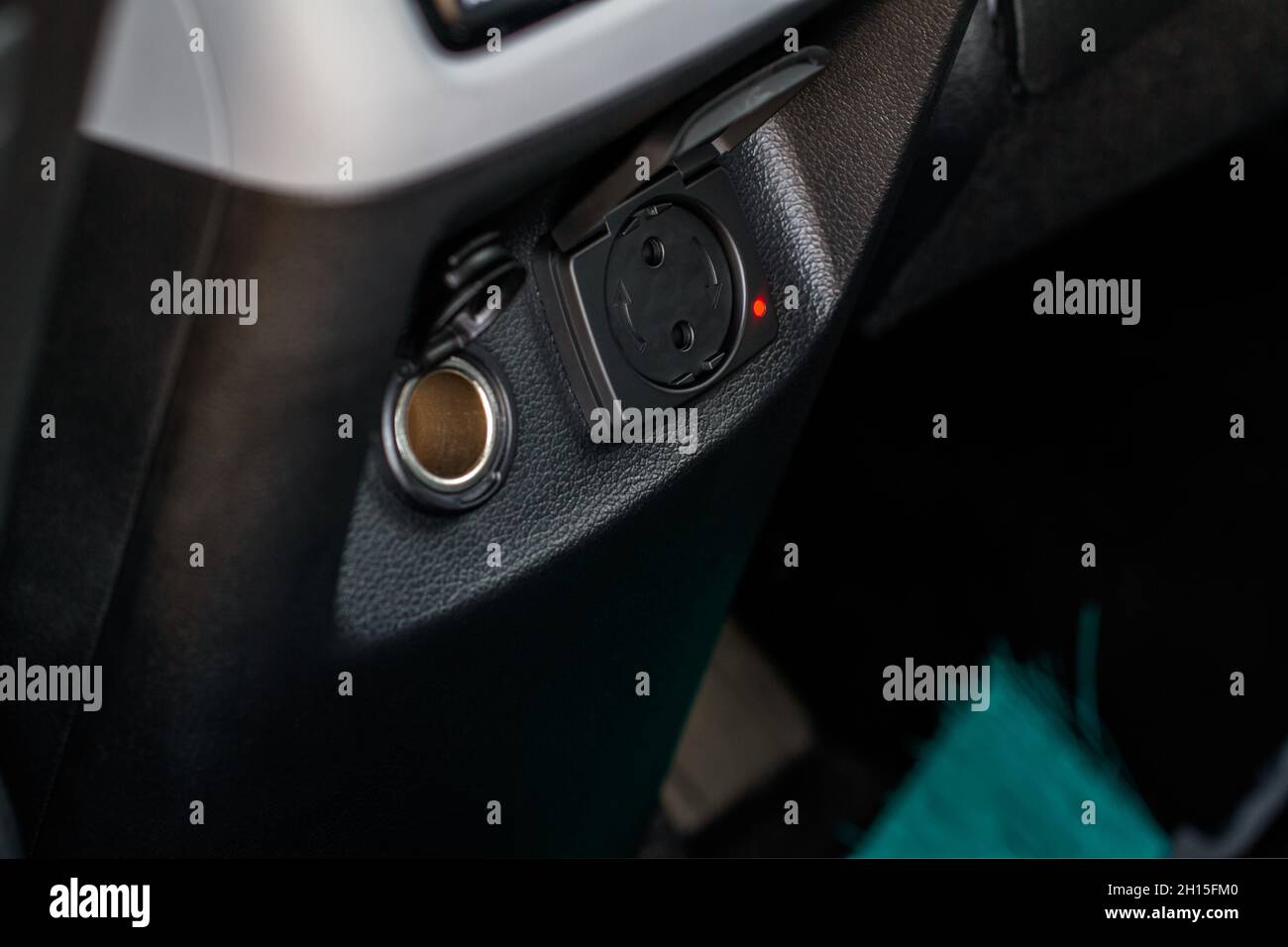 12V and 220v power outlet socket in the car. Opened sockets Stock Photo ...