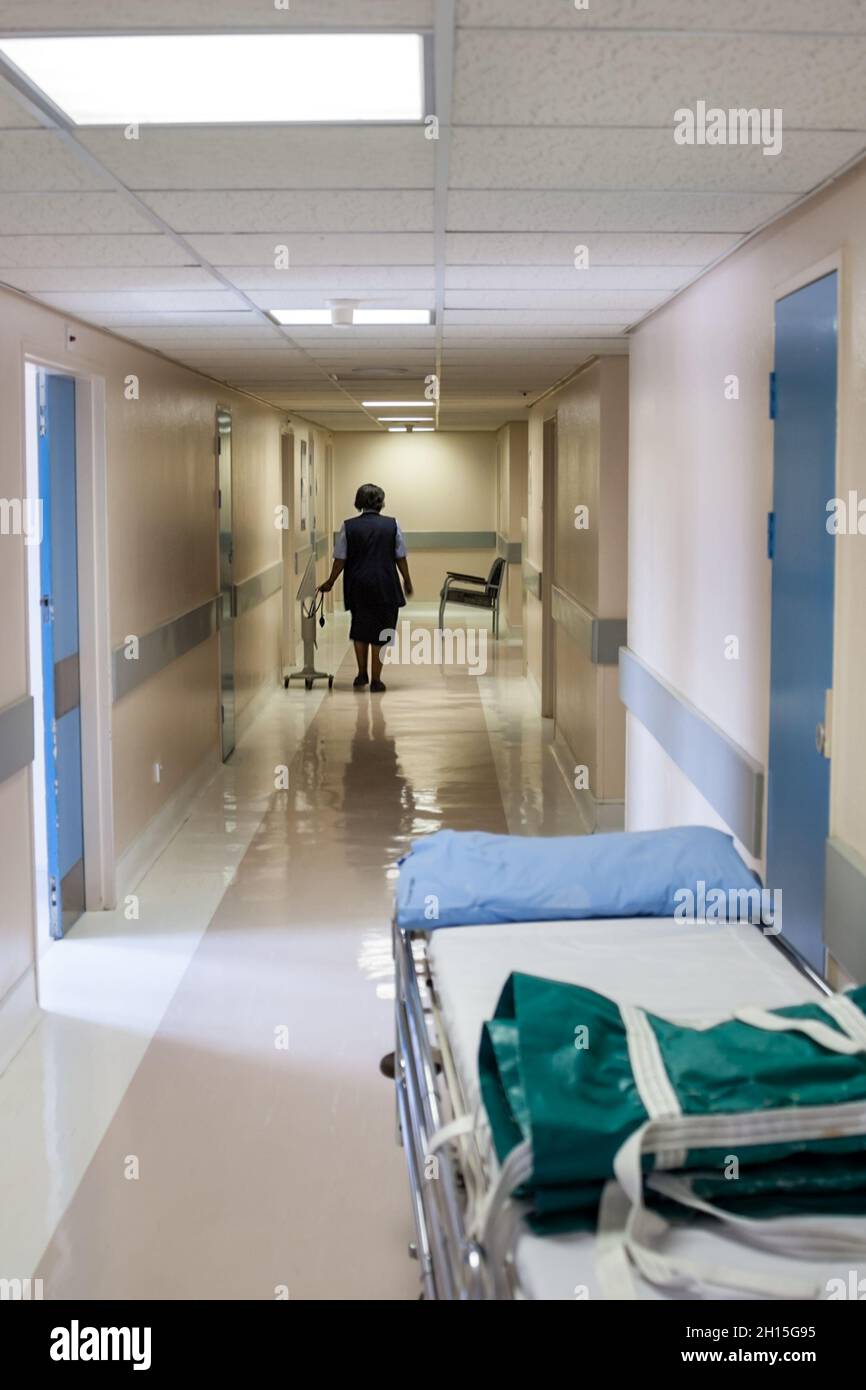 Generic hospital hallway, with a bed waiting for a patient, African ...
