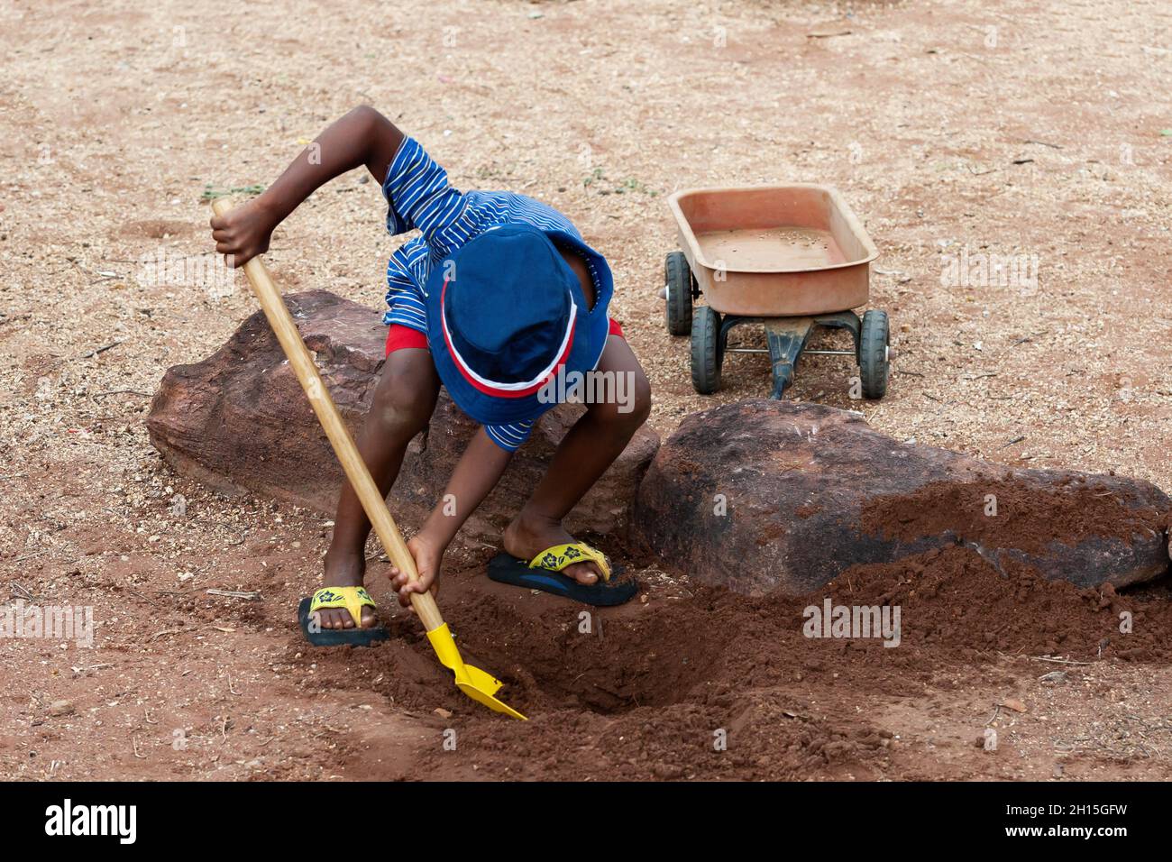 Playing dig digging hole hi-res stock photography and images - Alamy