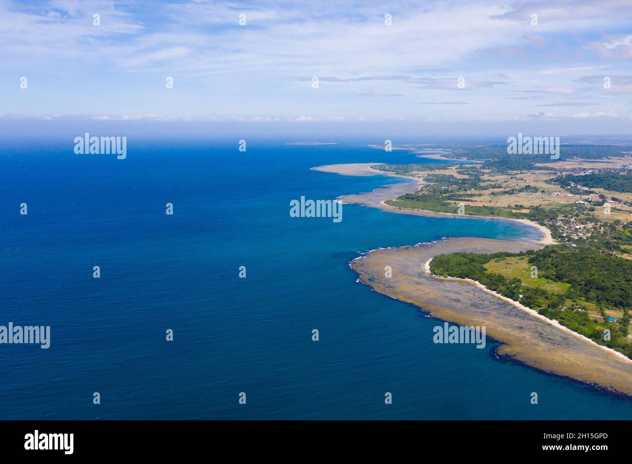 Coral reefs off the coast and turquoise lagoons. Luzon Island ...