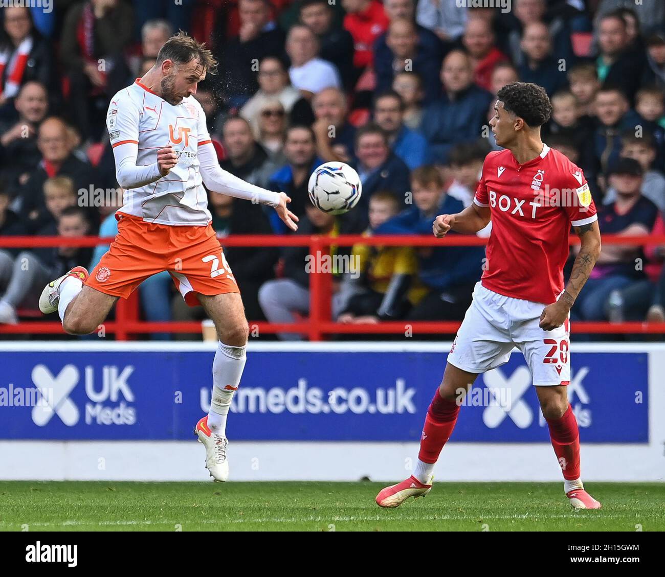 Richard Keogh #26 of Blackpool wins the header in, on 10/16/2021 ...