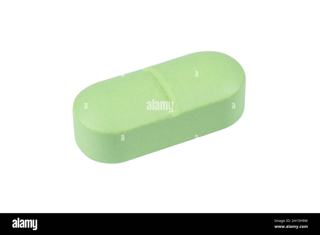 Macro shot green tablets pill isolated on white background. Pharmacy ...