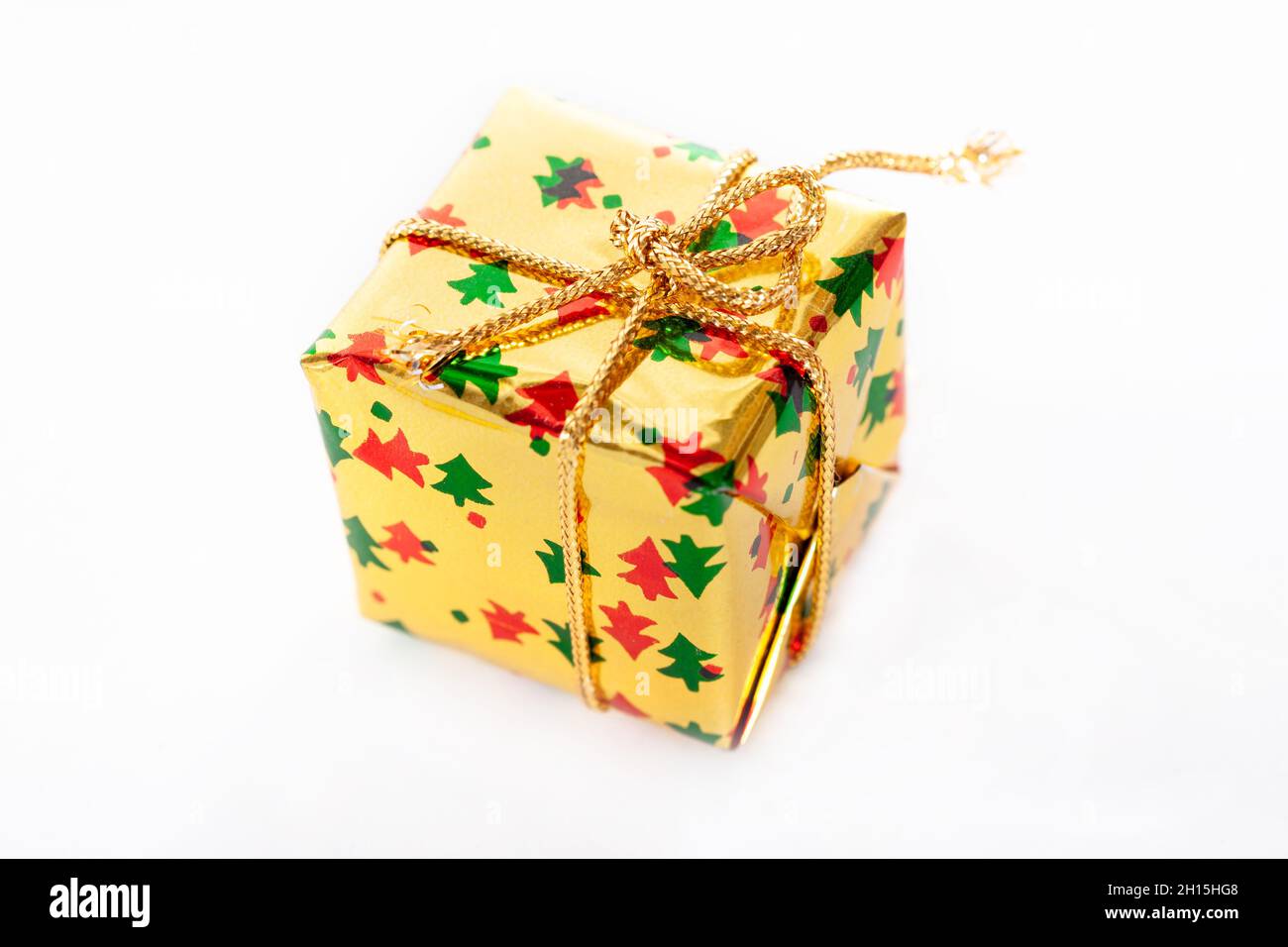 Traditional Christmas holidays globe cube shape , holding the string ...