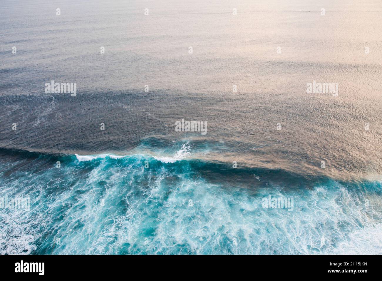 Deep blue stormy sea water surface with white foam and waves pattern ...