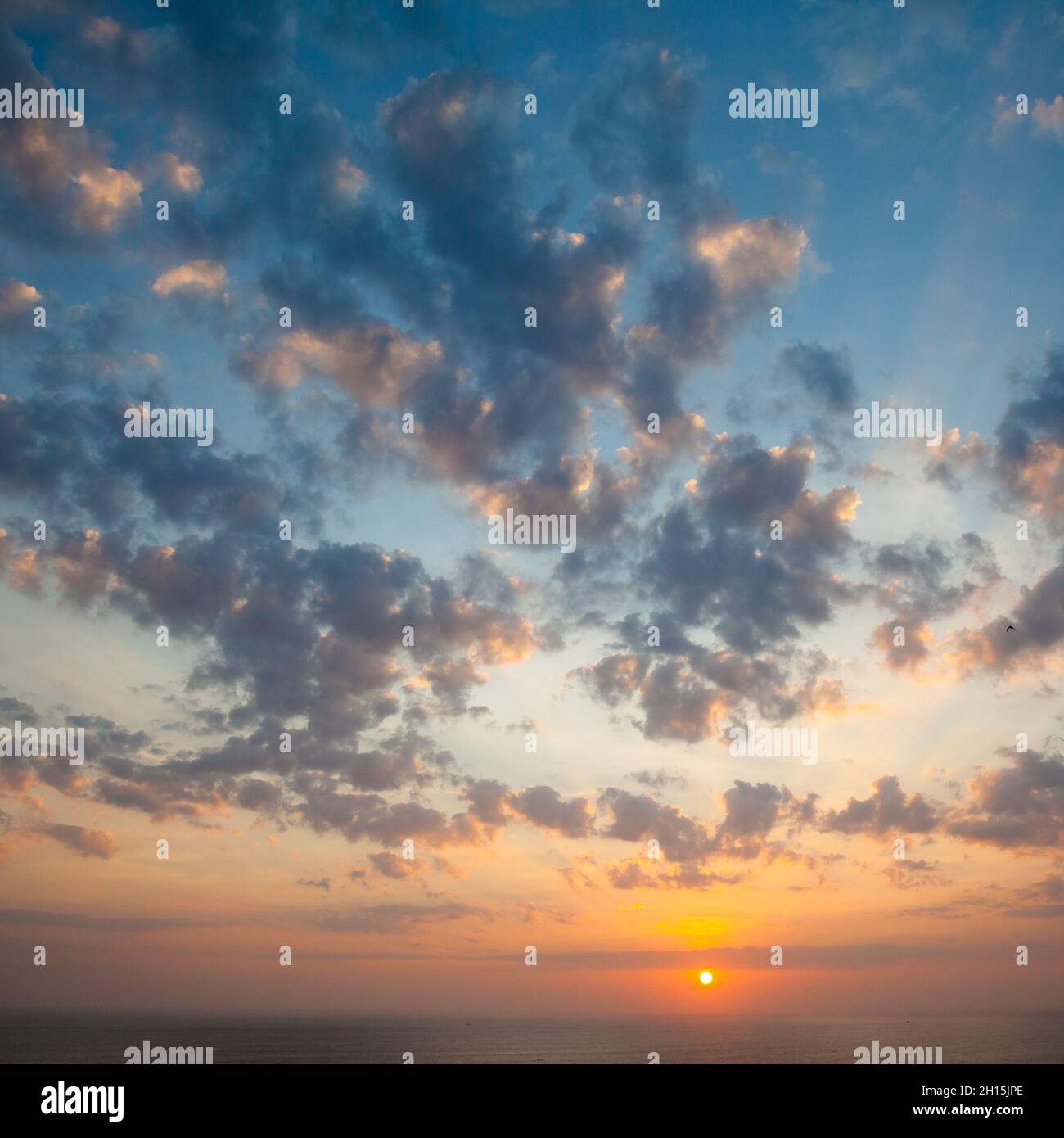 Beautiful sunset over the sea. Seascape. The sun is setting over the ...