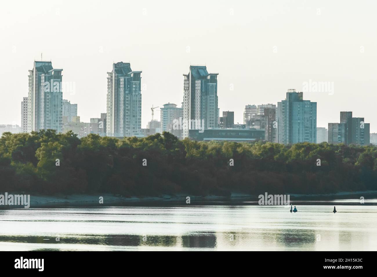 Cityscape view with buildings and architecture, urban river and park ...