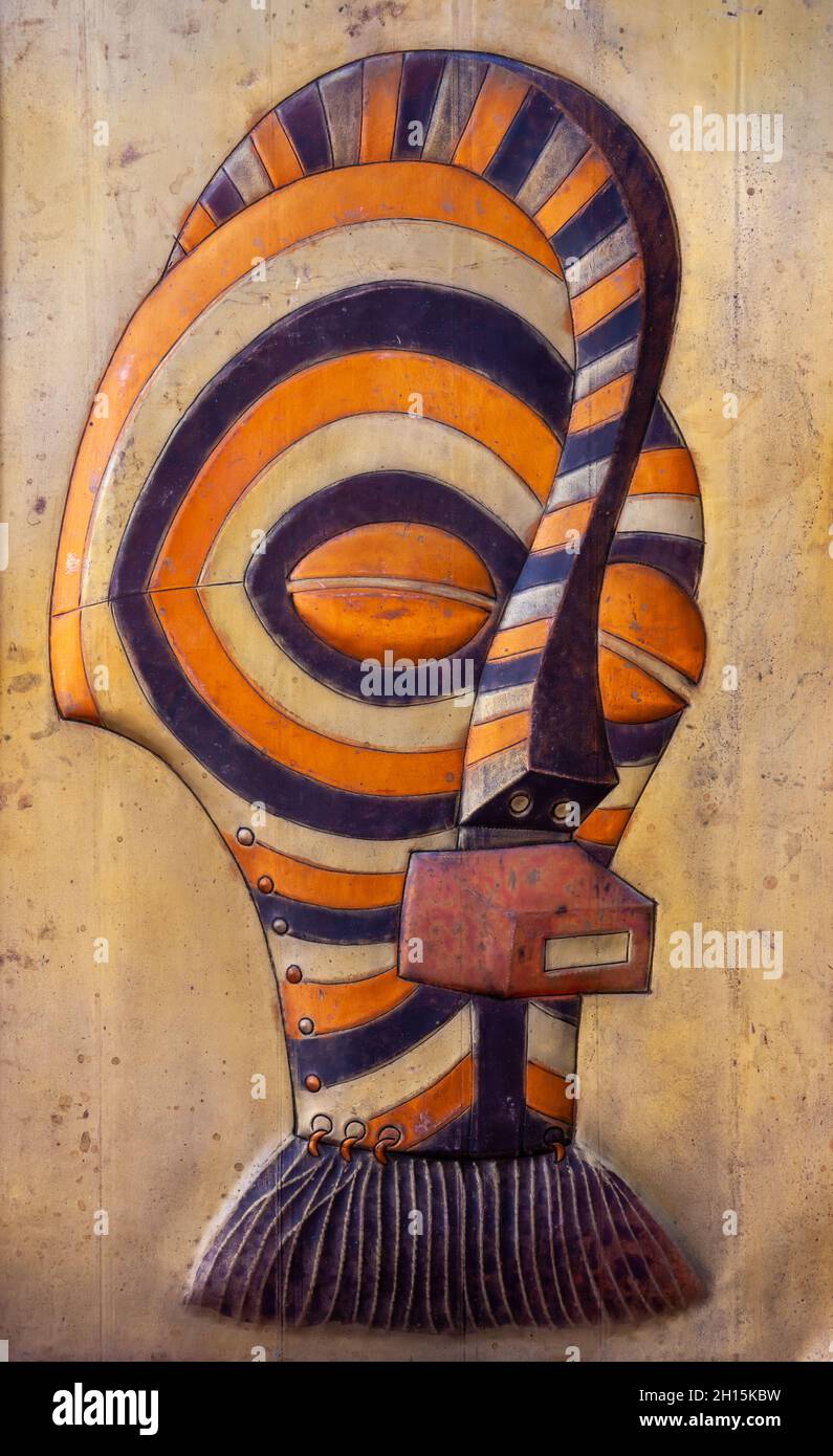 African relief metal art, mass produced to have a vintage look Stock ...