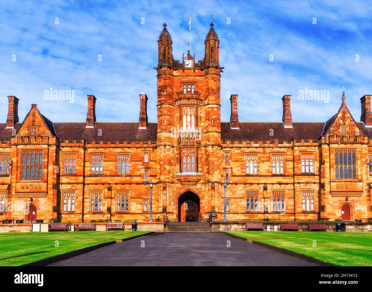 Clock tower of historic sandstone building of education precinct in ...