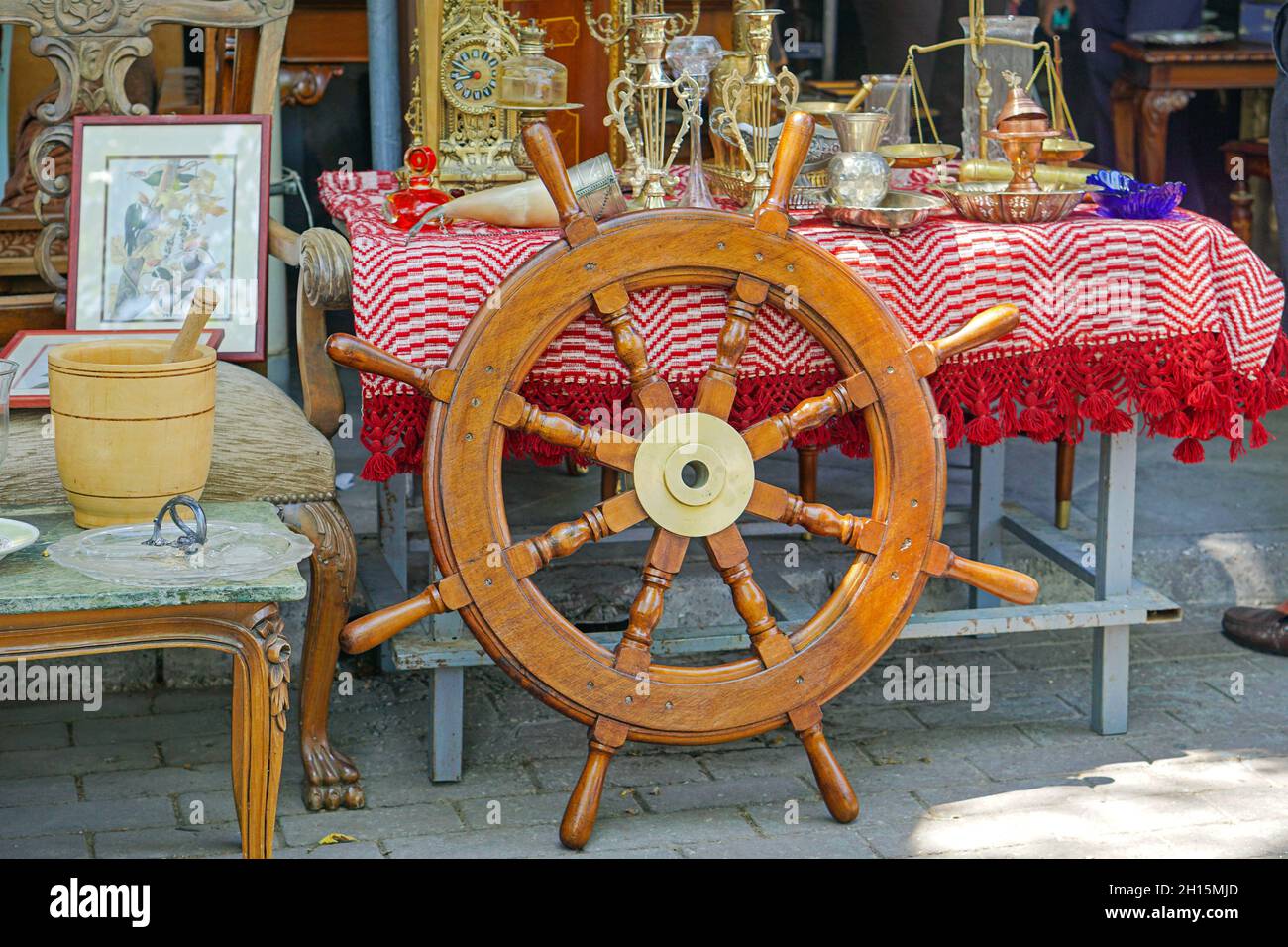 Athens, Greece - May 3, 2015: Old ship steering wheel at antique shop ...
