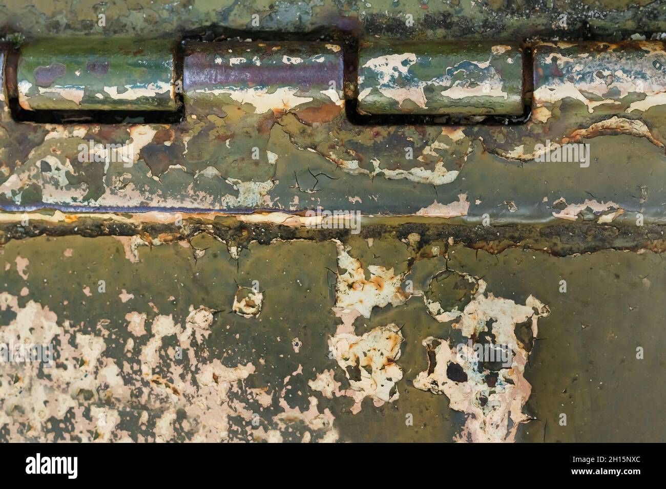 Photo of old and rusty military vehicle armored surface plate with hinge Stock Photo - Alamy
