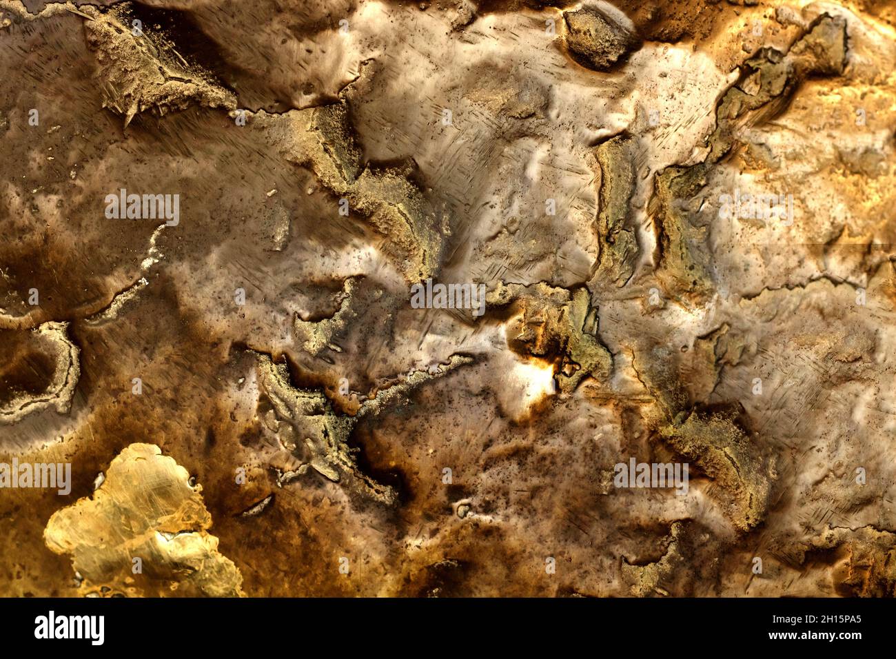Close-up photo texture of copper or bronze statue material with folds ...
