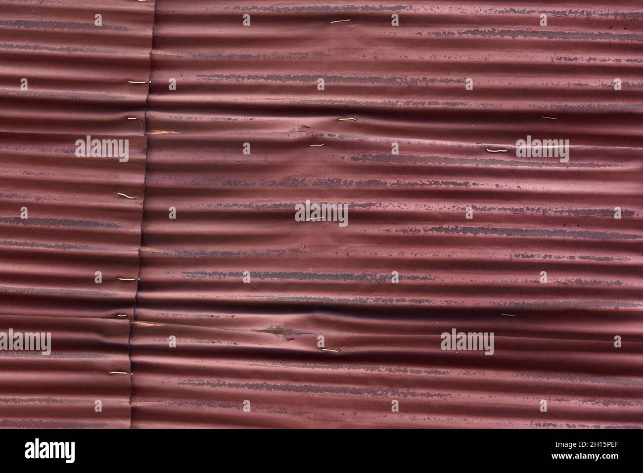 Photo texture of worn and damaged metal fence shields Stock Photo - Alamy