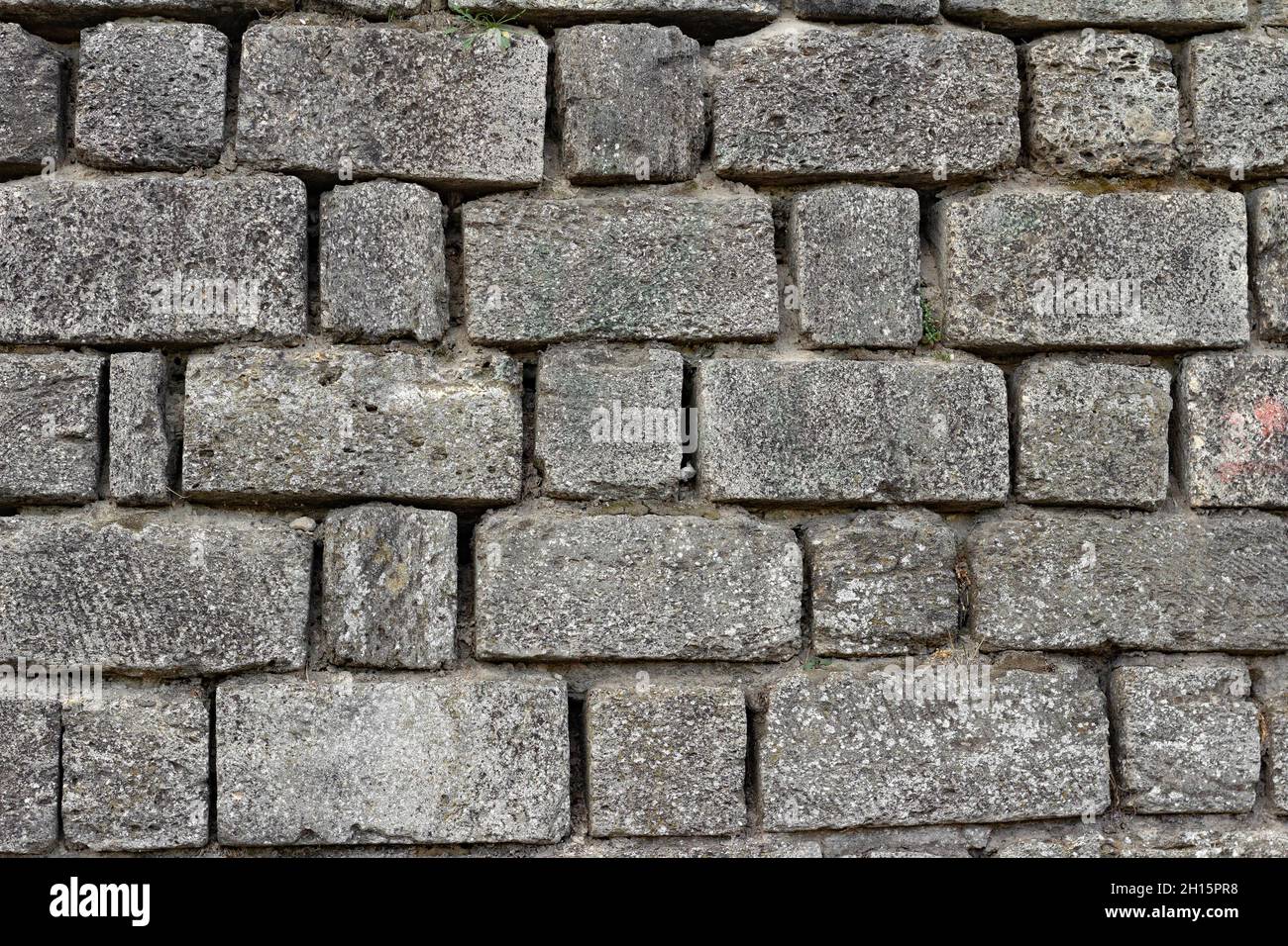 Photo texture of old and ancient gray colored stone wall Stock Photo ...