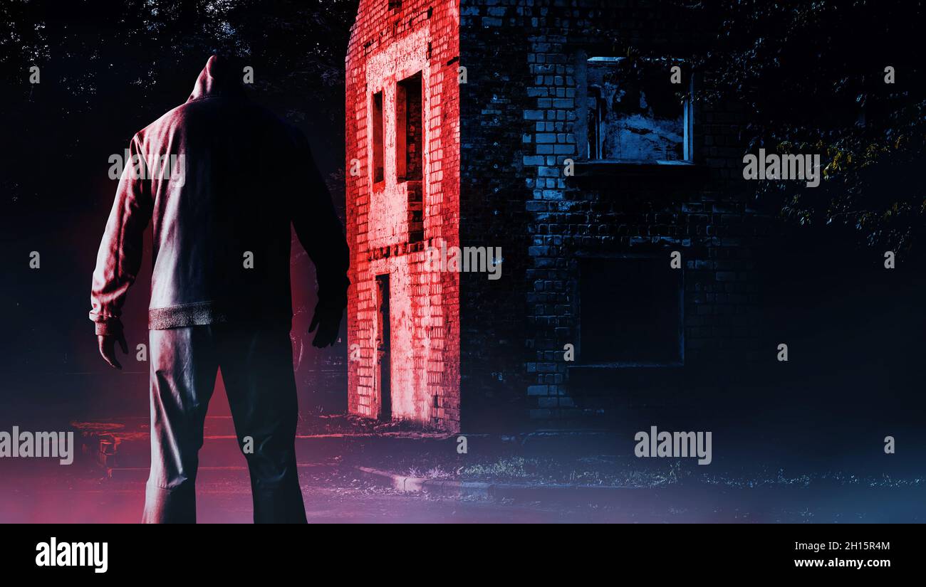 Photo of scary horror stranger stalker man in black hood and clothing ...