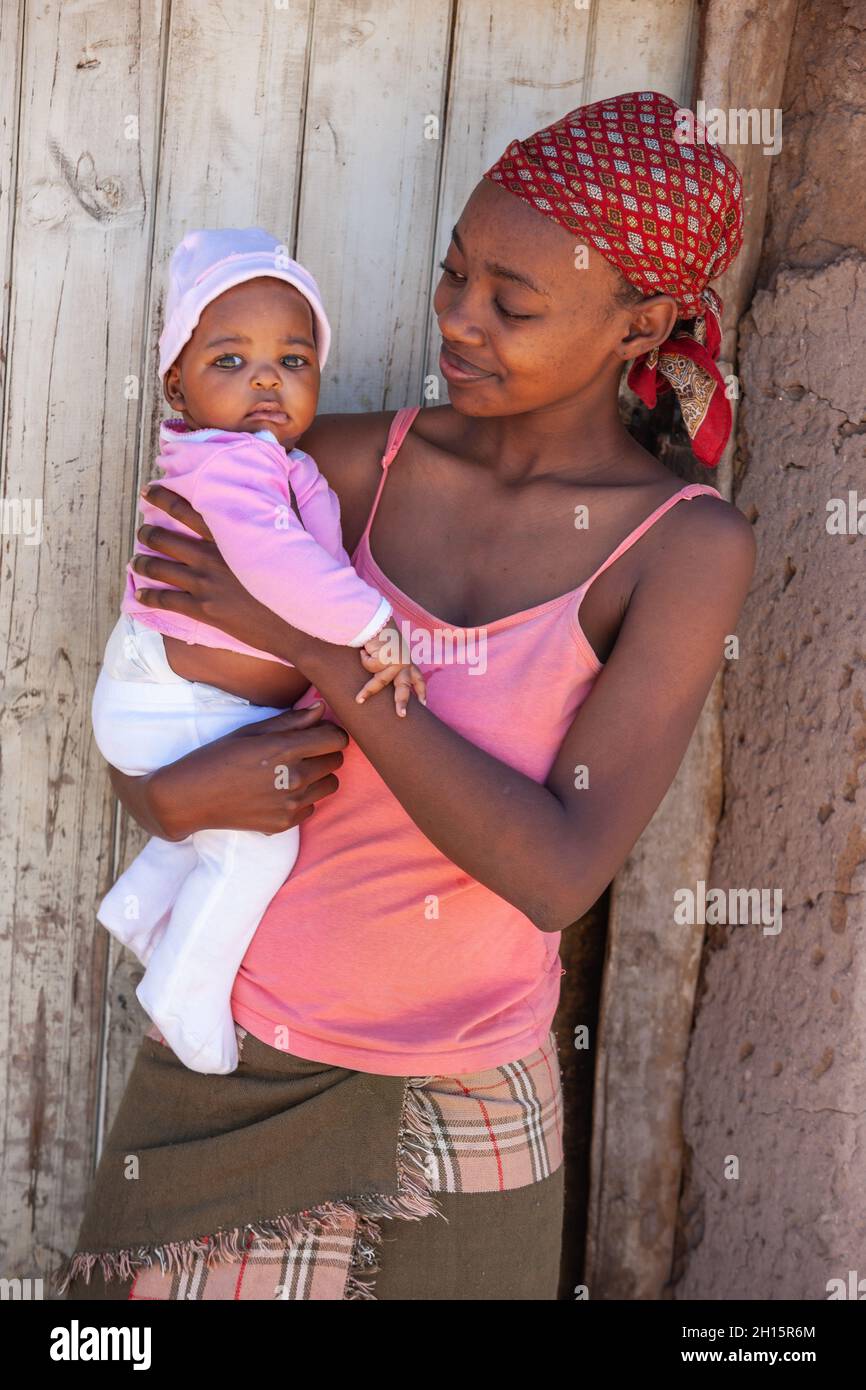 Single young African mother in a village in Botswana, the drama of ...