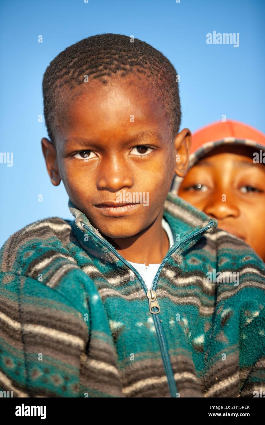 African kids in the yard of the village in Botswana, rural area ...