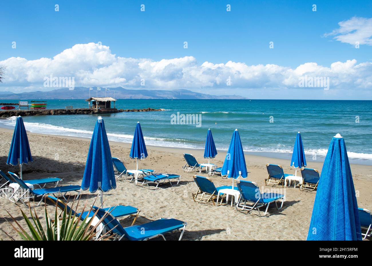 Crete island, Greece Agia Marina beach near Chania Parasols and sun ...