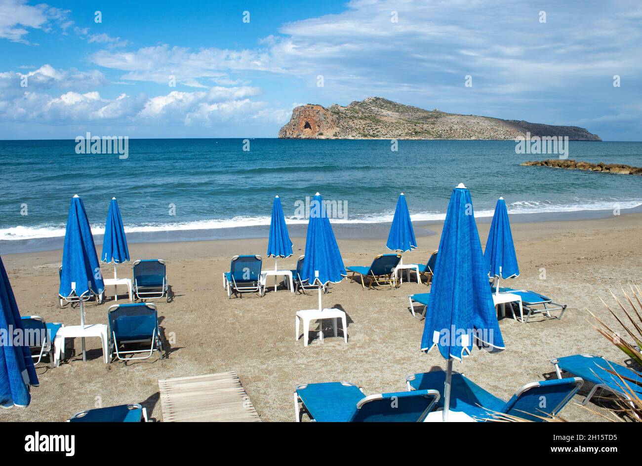 Crete island, Greece Agia Marina beach near Chania Parasols and sun ...