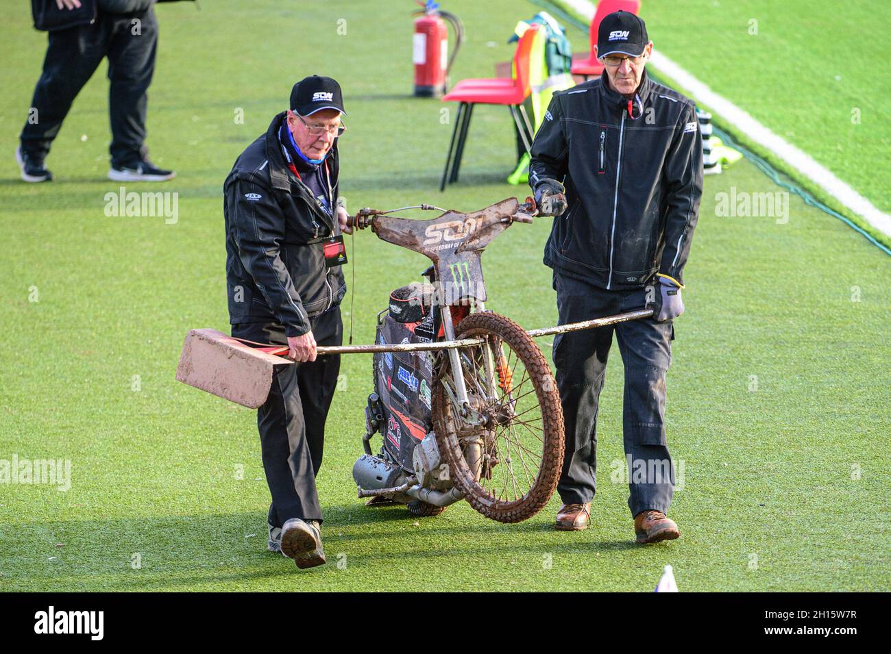 MANCHESTER, UK. OCT 16TH Track Staff carry off Jacob Thorsell's bike after his fall during the ...