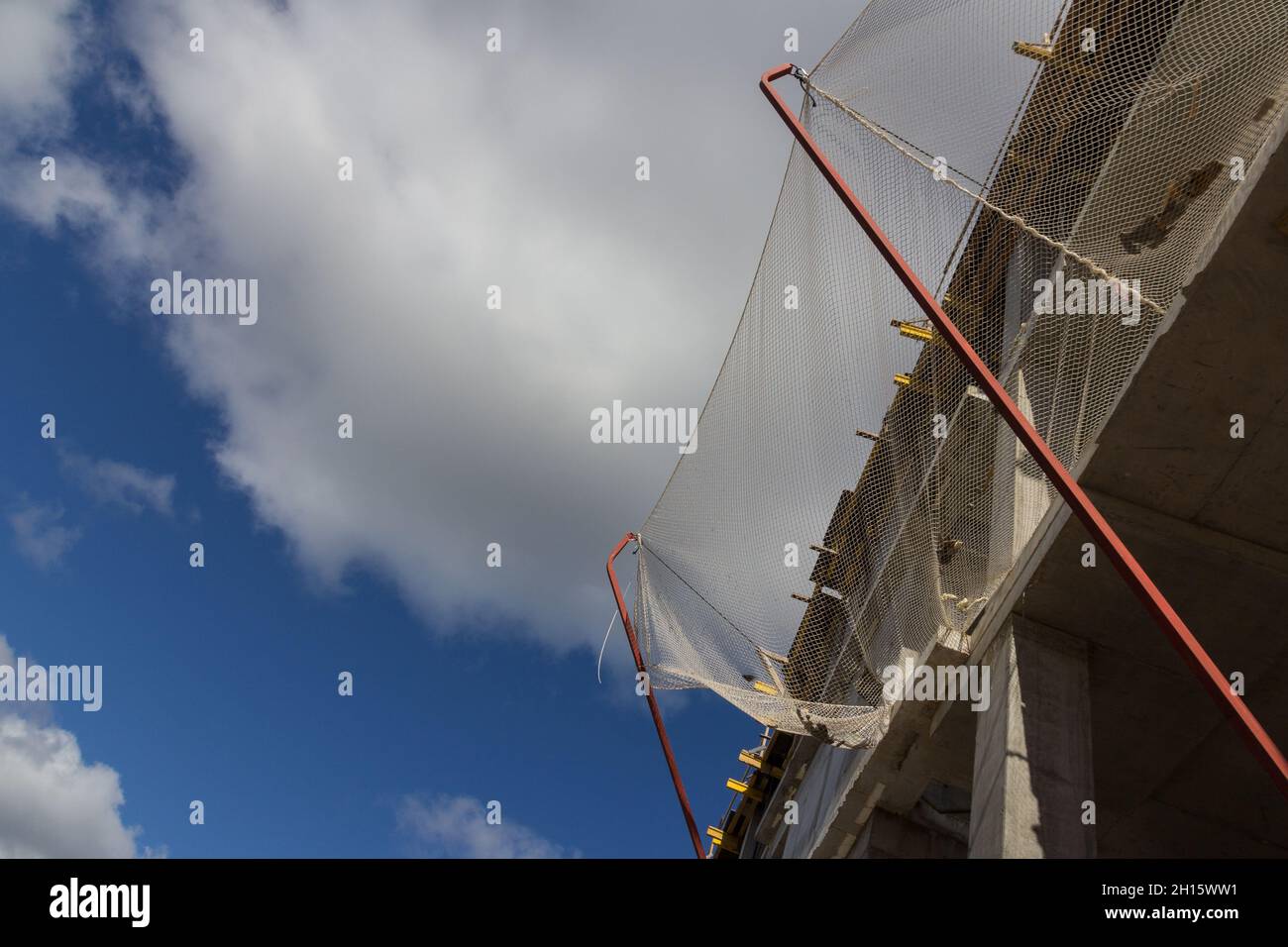 Construction safety net. A construction mesh that prevents objects from ...