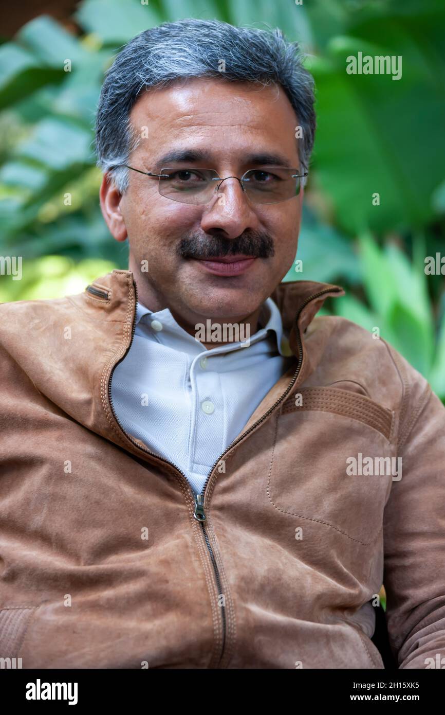 Portrait of an Iranian Arabic business man smiling Stock Photo - Alamy