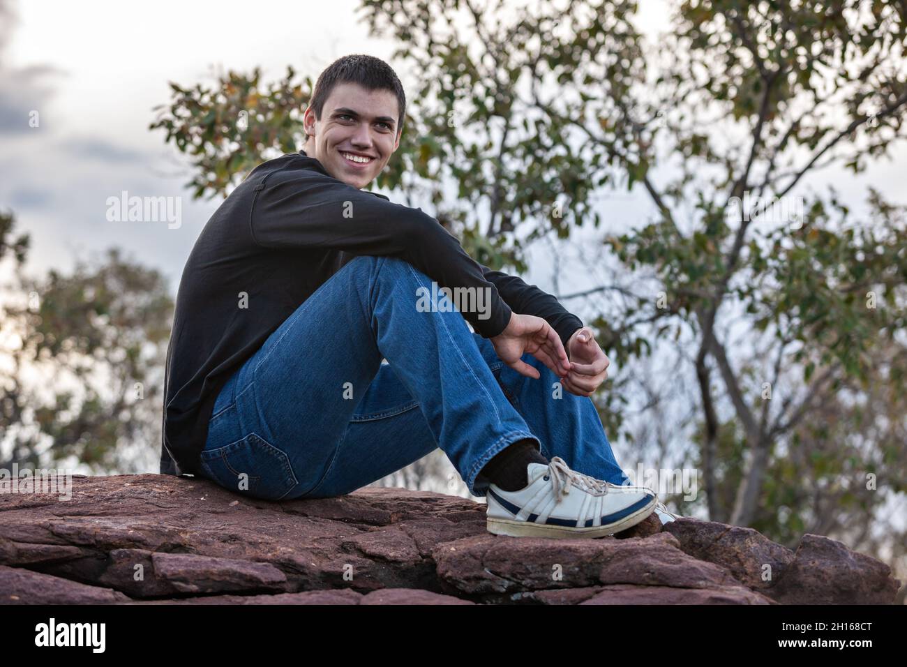 Smiley teenager hi-res stock photography and images - Alamy