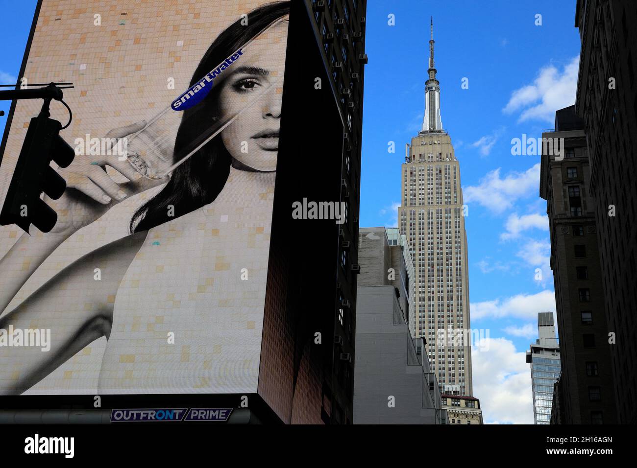 The view of Empire State Building with an advertising billboard in ...