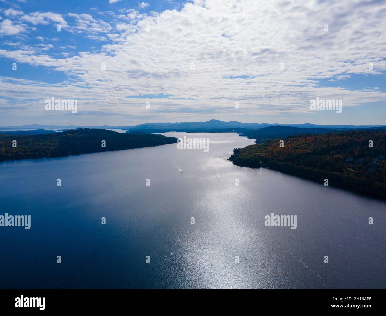 Aerial view of Meredith Bay in Lake Winnipesaukee in fall from town ...