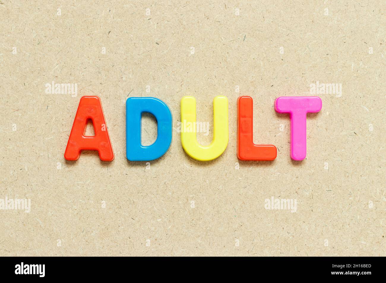 Color alphabet letter with word adult on wood background Stock Photo ...