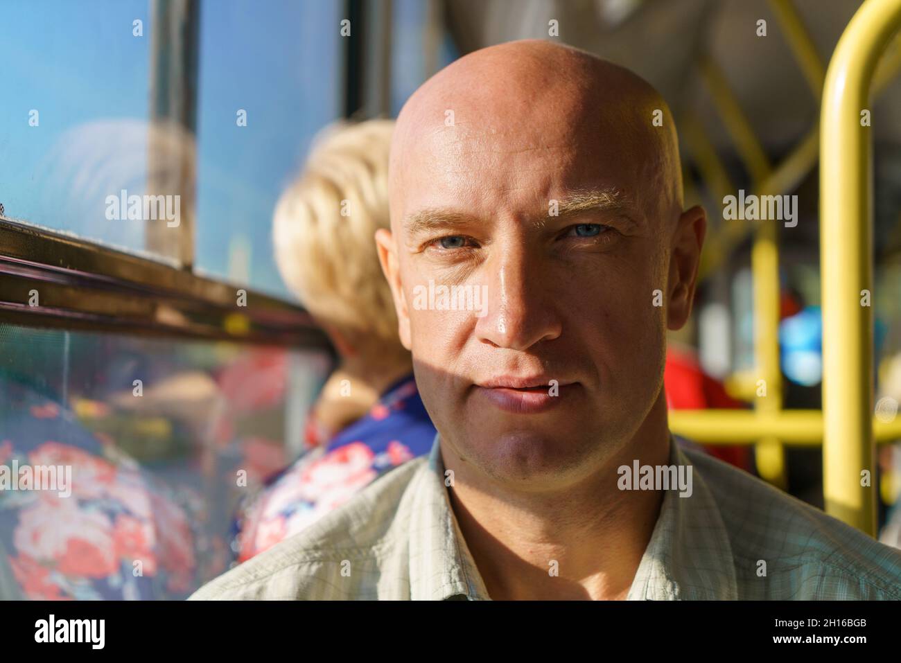 Bus interior with passengers. Passengers in a city bus. Modern public ...