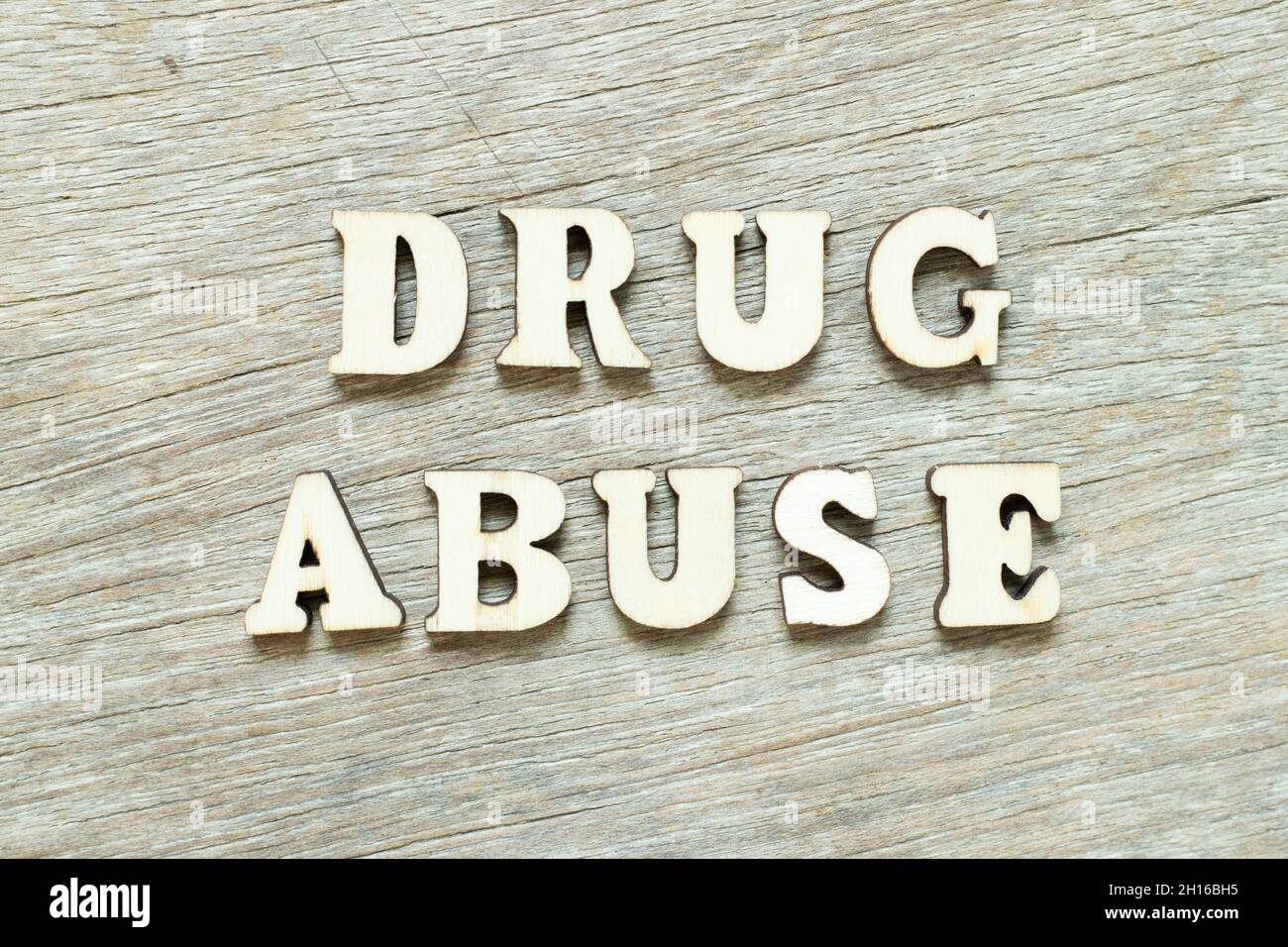 Alphabet letter in word drug abuse on wood background Stock Photo - Alamy