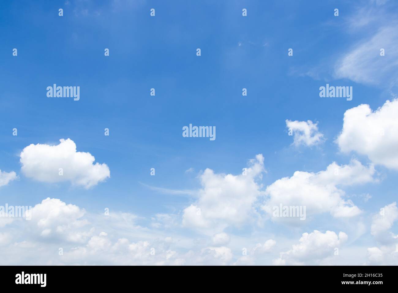 Clear blue color sky with white cloud background Stock Photo - Alamy