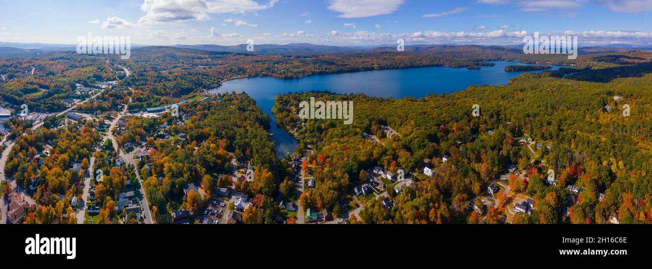 Panoramic aerial view of Lake Waukewan in fall from town center of ...