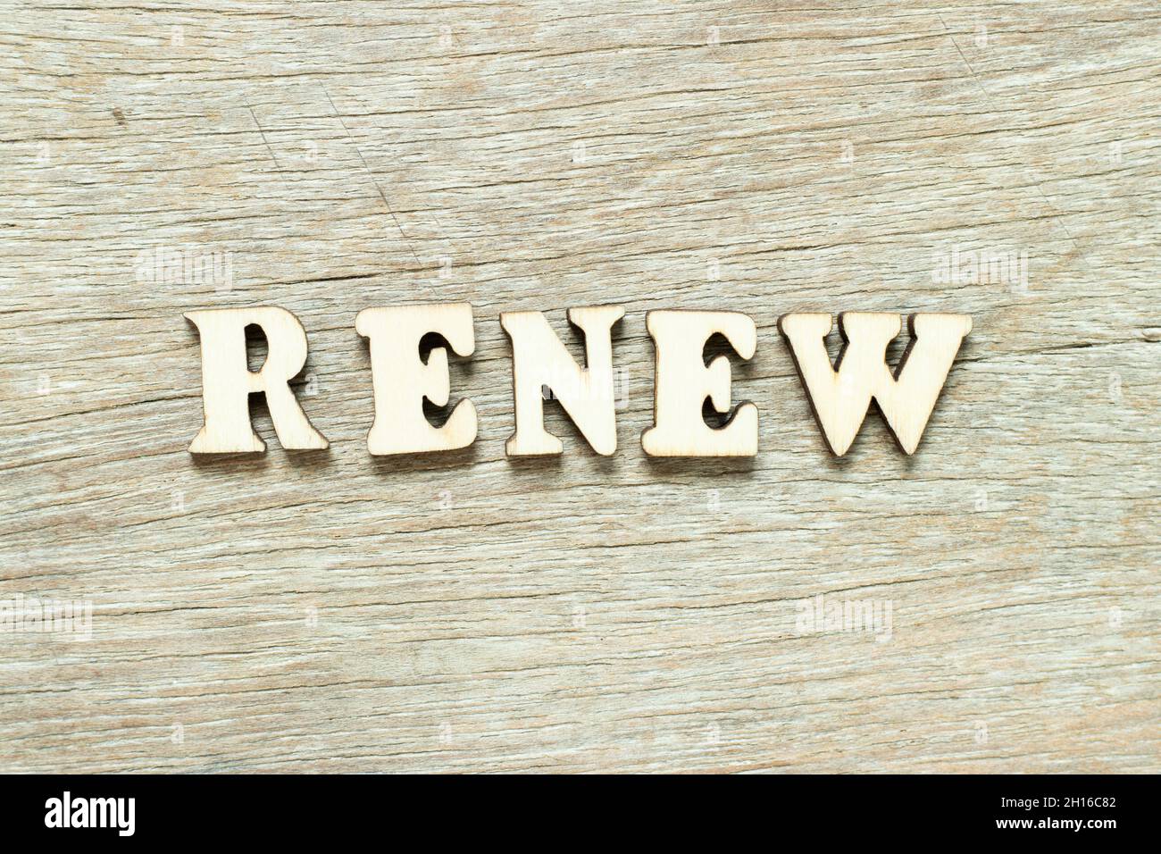 Alphabet letter in word renew on wood background Stock Photo - Alamy