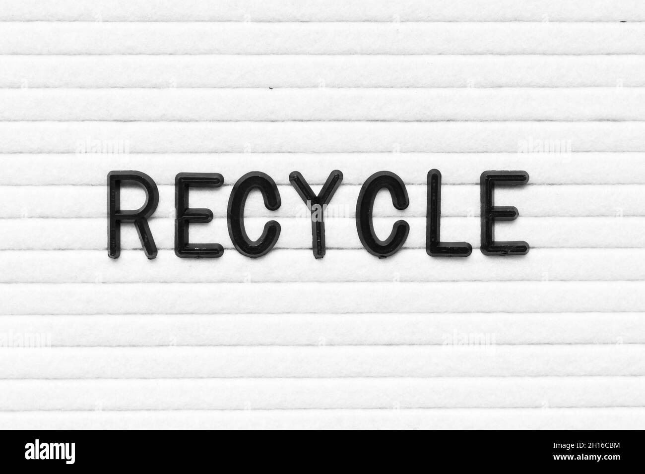Black letter in word recycle on white felt board background Stock Photo ...