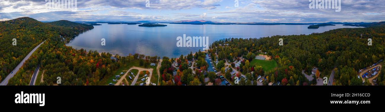 Aerial view of Lake Winnipesaukee in fall with Ossipee Mountains at the ...
