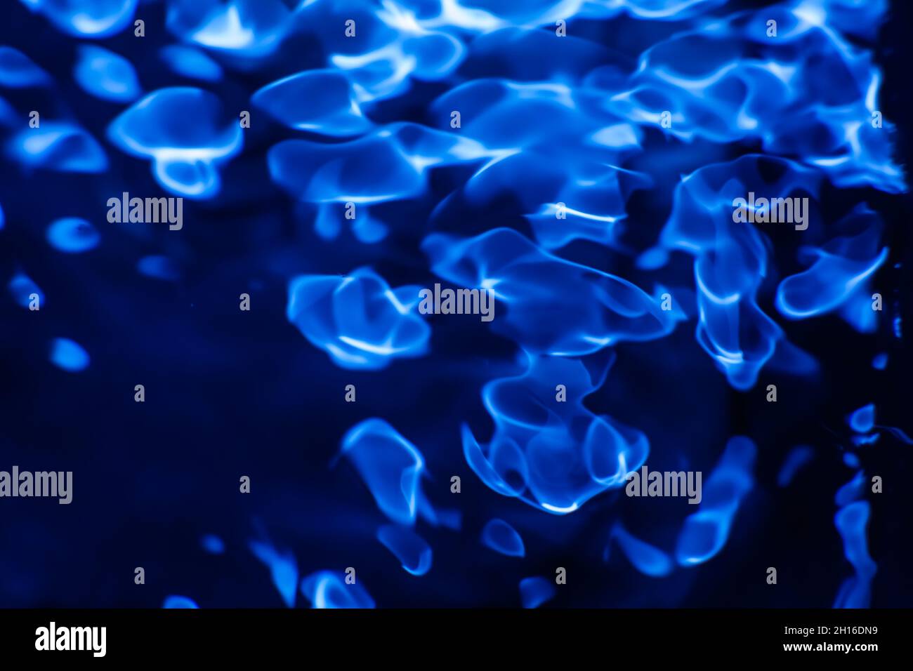 Sound waves in the visible blue color in the dark Stock Photo - Alamy